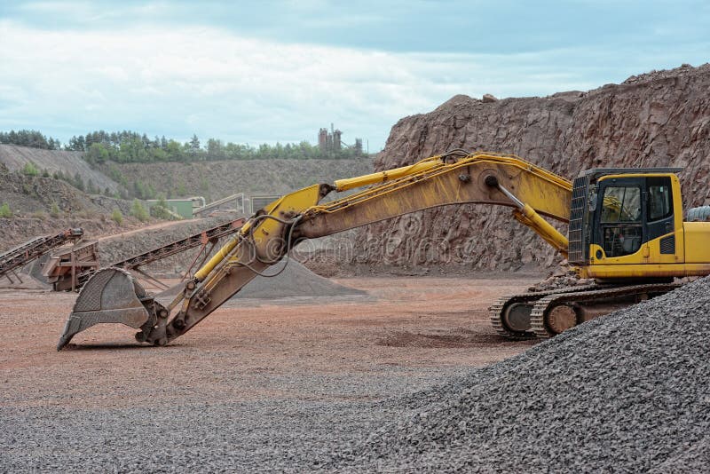 Earth Mover in a Porphyry Rock Quarry Stock Photo - Image of equipment ...