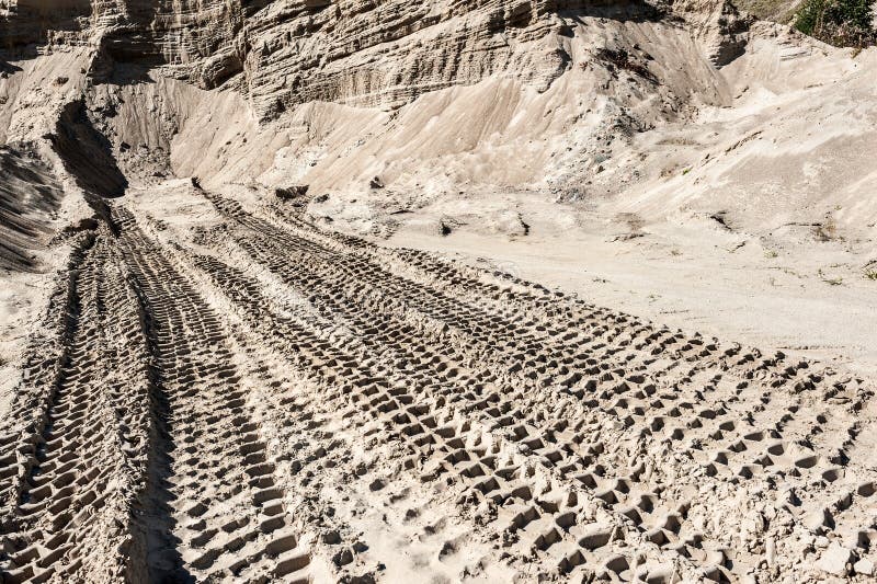 Earth Mover Tire Tracks in Gravel Pit Stock Image - Image of open, sand ...