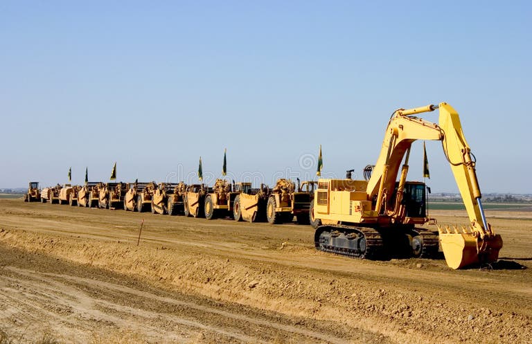 Earth Movers on Parade. stock image. Image of destroy, shovel - 361963