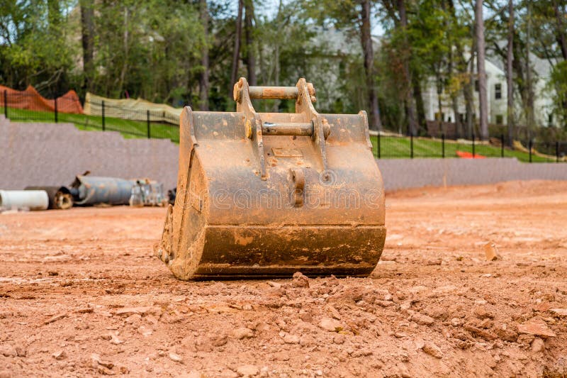Earth Moving Equipment in Dirt Field Stock Image - Image of heavy ...