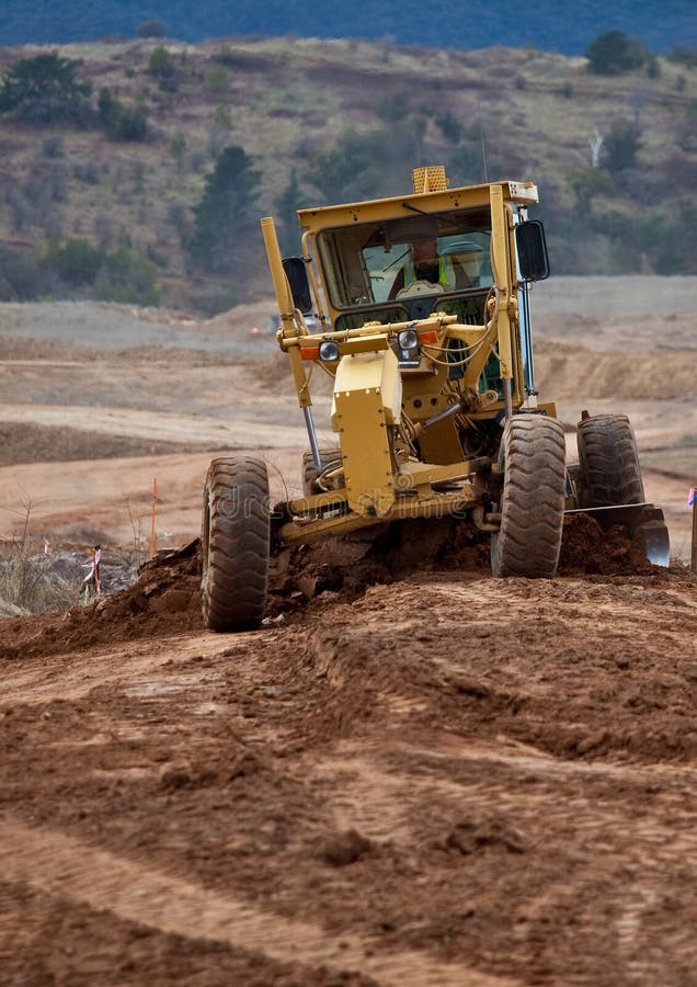 Earth Moving Equipment at Work Stock Photo - Image of graders ...