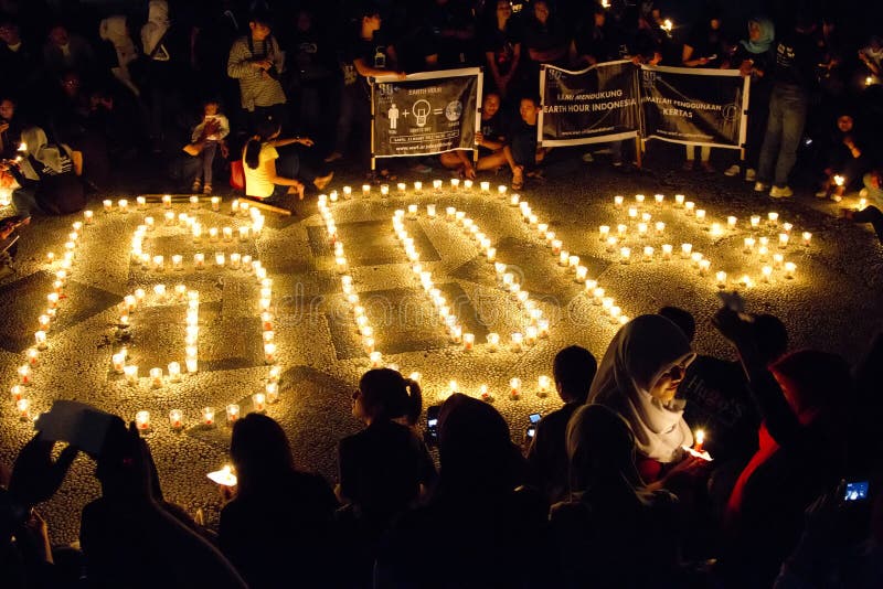 Earth hour candle editorial stock image. Image of global - 21461934