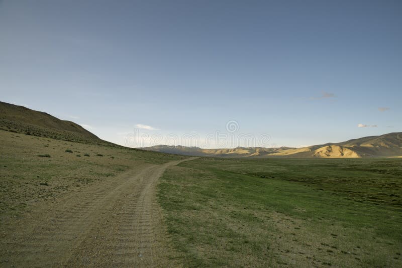 Earth Road among Green Valley Stock Photo - Image of highway, holiday ...