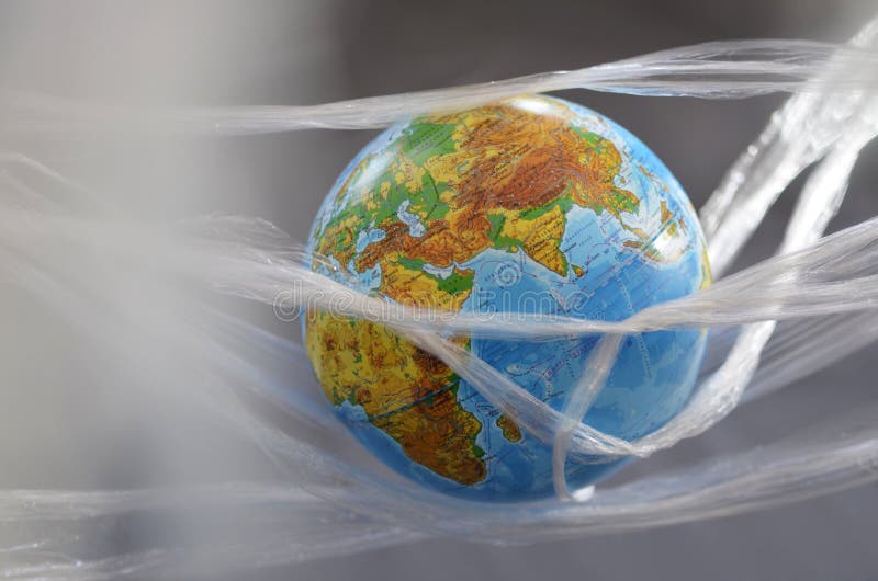 The Earth is Suspended in a Plastic Plastic Disposable Packaging, on a ...