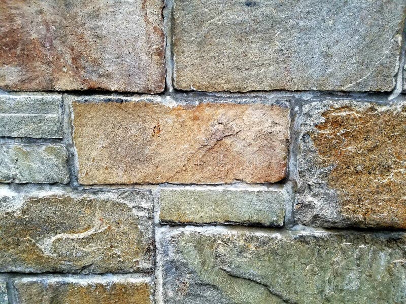Wall Made of Natural Stones with Mortar Color Variation Stock Photo ...