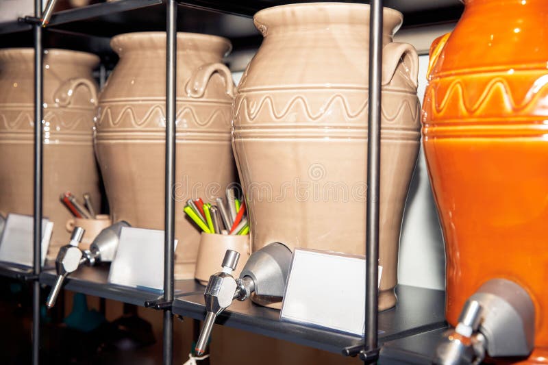 Earthenware Jars with Spigots on a Shelf, Kitchen Utensils Inside ...