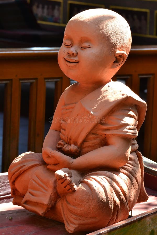 Earthenware of Little Buddhist Monk. Stock Image - Image of pose ...