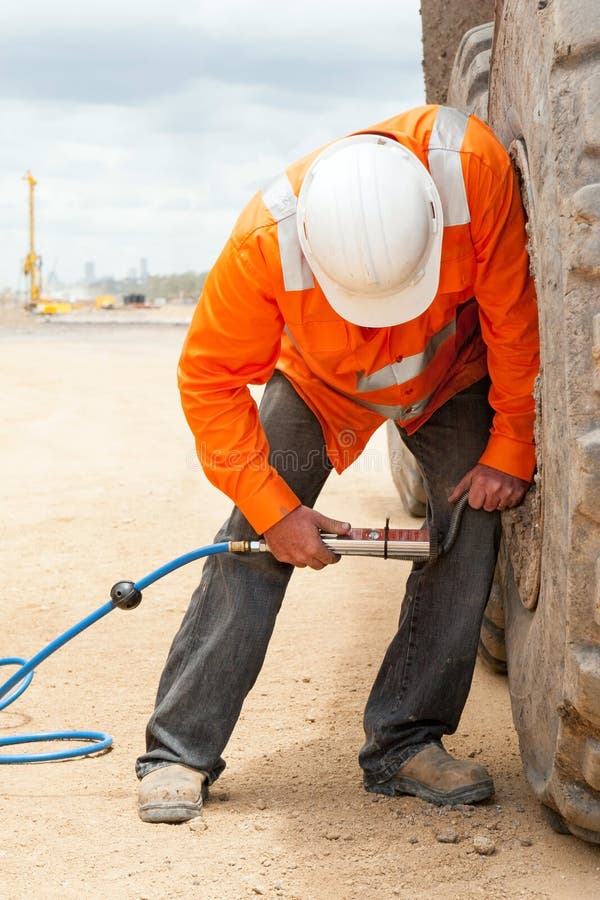 Construction Machine Tyre Pressure Service Stock Image - Image of ...