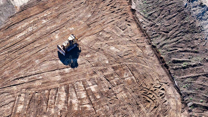 Earthmoving Equipment. Aerial View of a Large Construction Site with ...