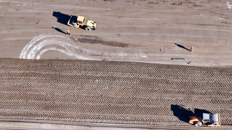 Earthmoving Equipment. Aerial View of a Large Construction Site with ...