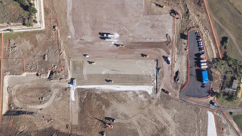 Earthmoving Equipment. Aerial View of a Large Construction Site with ...