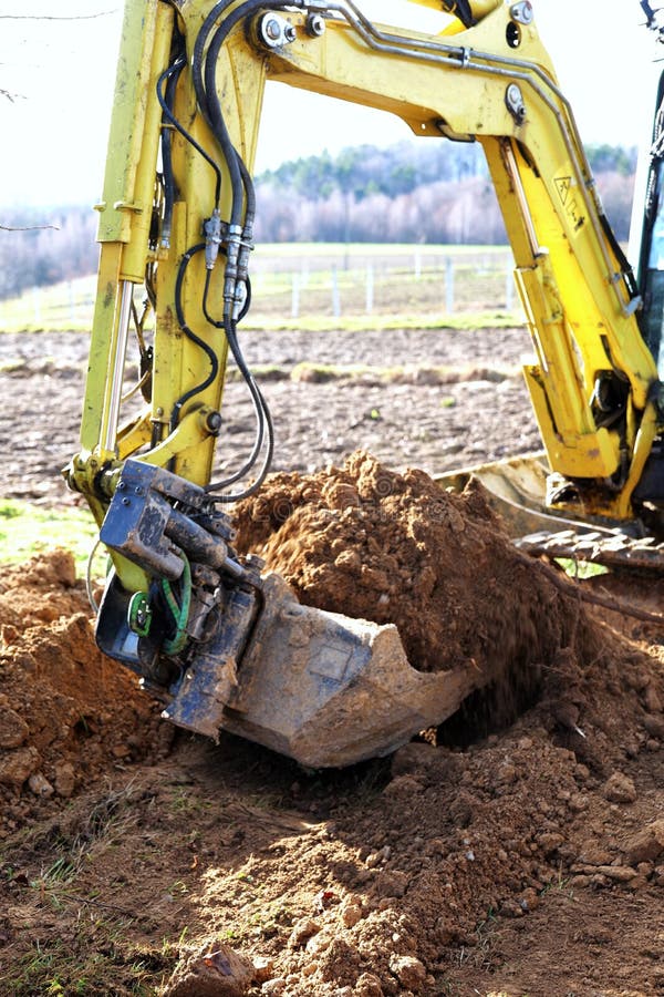 Earthmoving Using a Small Crawler Excavator Stock Image - Image of ...