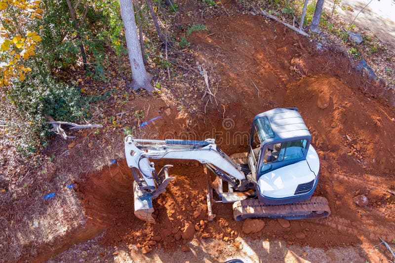 During Earthmoving Works at a Construction Site, Crawler Excavators ...