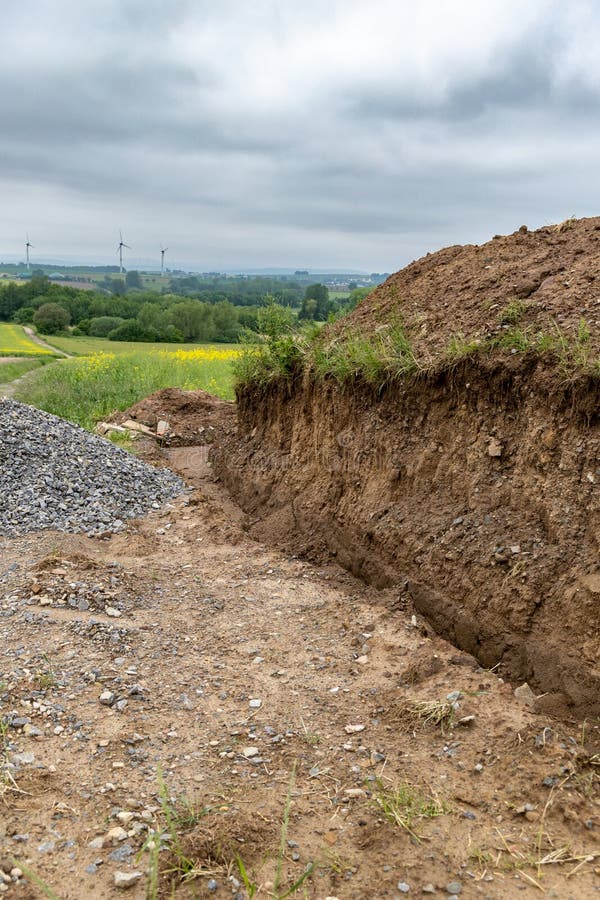 Earthworks, Digging Trench. Long Earthen Trench Stock Photo - Image of ...