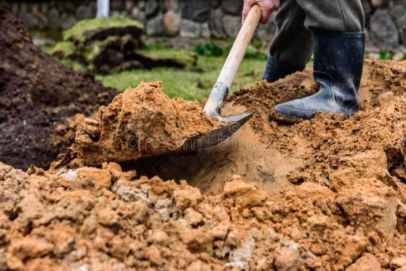 Earthworks, Man Digging Trench Using Shovel. Stock Image - Image of ...