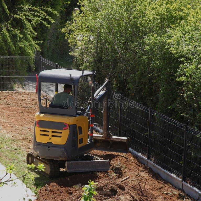 Earthworks with a Mini Digger Stock Photo - Image of mini, mechanical ...