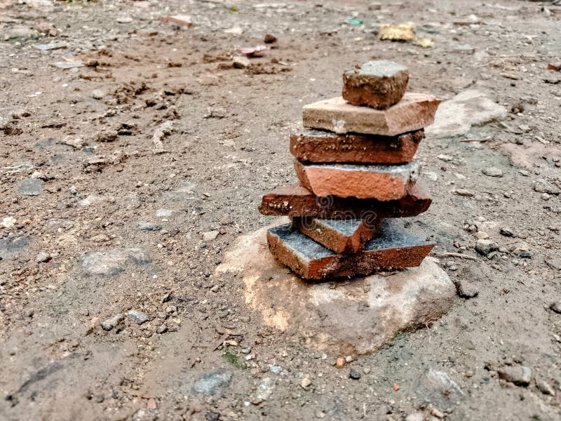 Earthy Brick Sculpture on Dirt Ground – Outdoor Minimalism Stock Photo ...