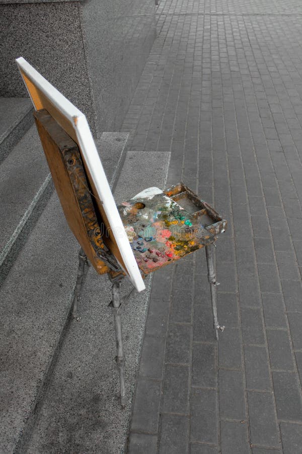 An Easel and a Palette in the Street on Stone Background 2 Stock Photo ...