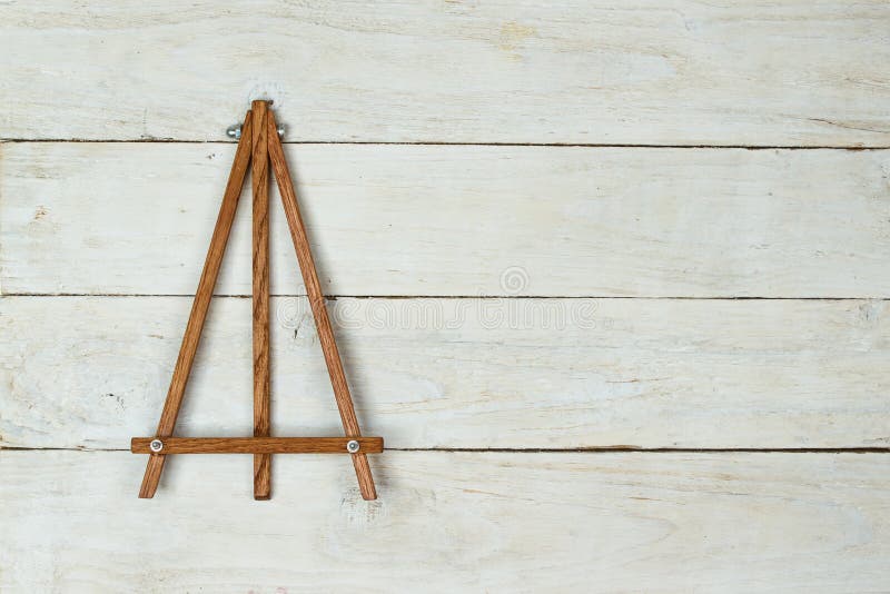 Easel on wooden table stock photo. Image of wooden, empty - 45005272