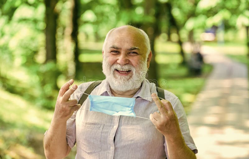 Easing of Lockdown Restrictions. Mask Protecting from Virus. Pandemic ...