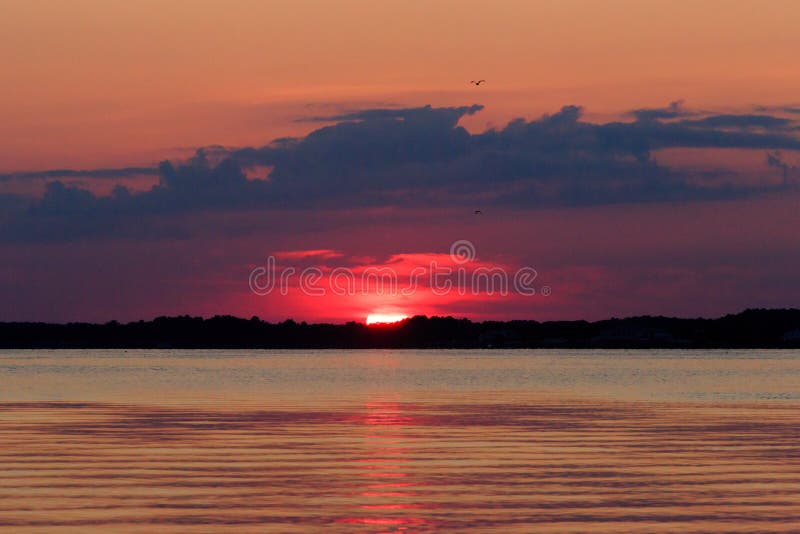 East coast red sky sunset stock image. Image of shore - 127428969