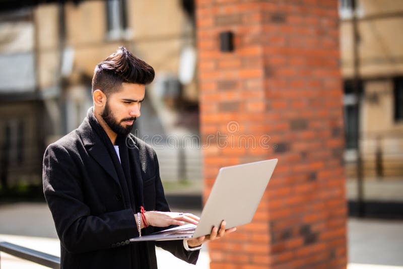 East Indian College Student at Campus, Works on Laptop Computer Stock ...