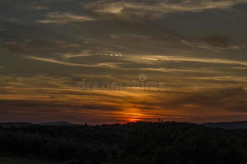 East, sunset stock image. Image of sunset, trees, shield - 96457027