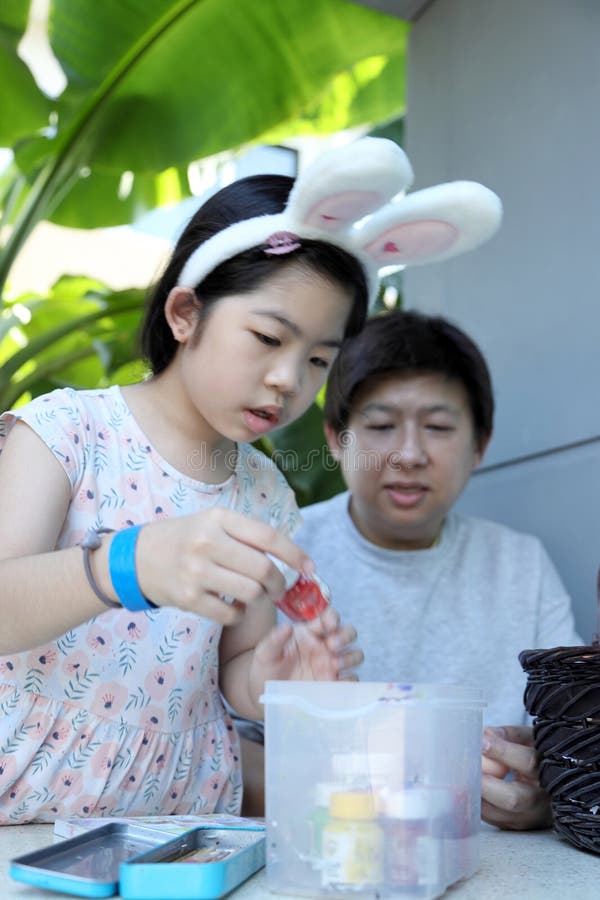 Easter in Asian stock photo. Image of sitting, paint - 354996090