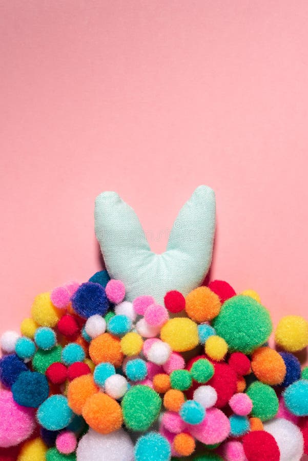 Easter Background, with Multicolored Fluffy Bunny Tails and a Toy ...