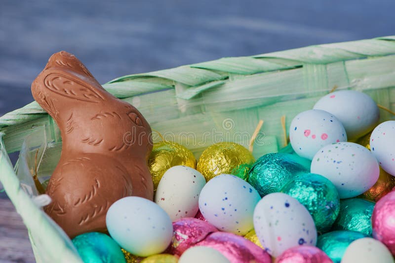 Easter Basket with Chocolate Bunny and Sweet Eggs Stock Photo - Image ...