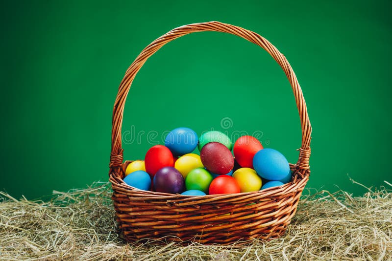 Easter Basket with Multicolor Eggs, Green Background Stock Image ...