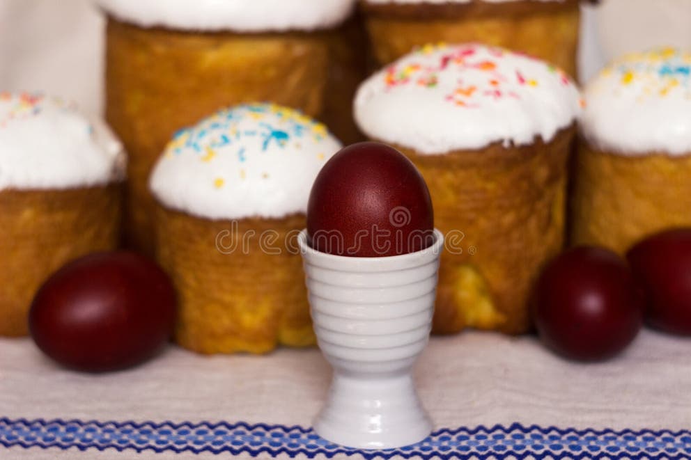 Easter Bread with Icing and Colourful Sprinkles on a Table with Easter ...