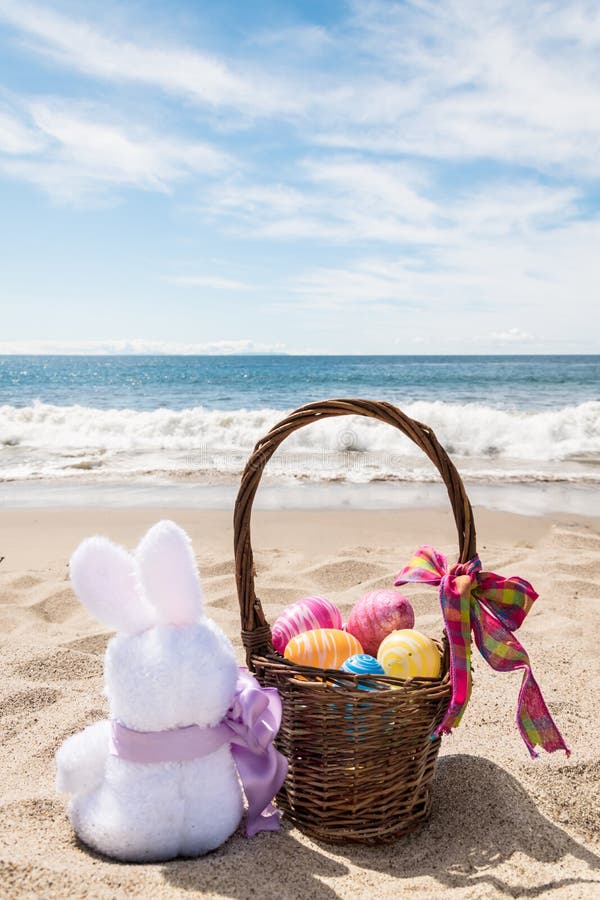 Easter Bunny with Color Eggs on the Ocean Beach Stock Image - Image of ...