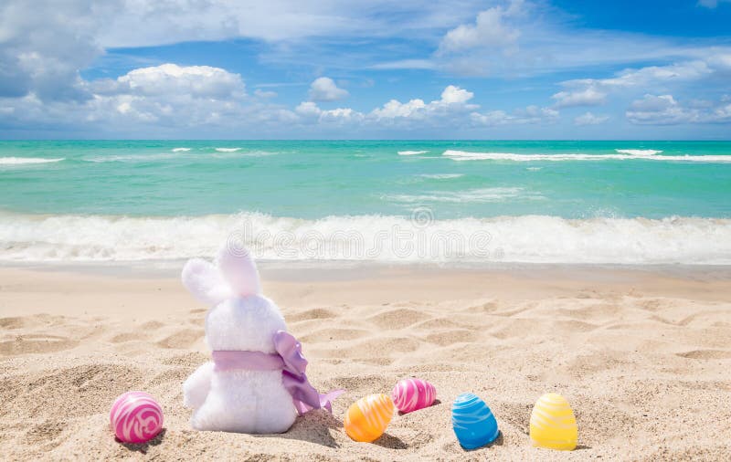 Easter Bunny with Color Eggs on the Ocean Beach Stock Photo - Image of ...