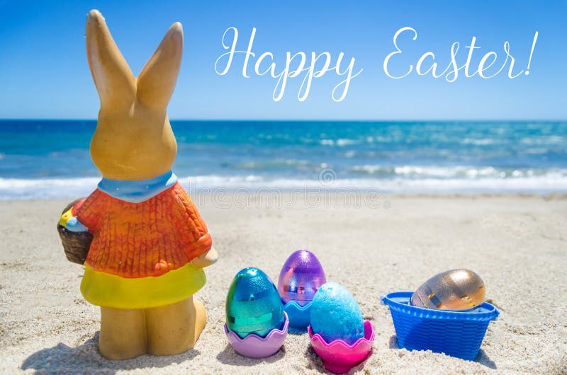Easter Bunny with Color Eggs on the Ocean Beach Stock Photo - Image of ...