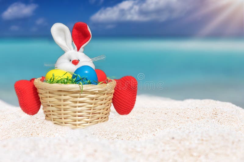 Easter Bunny with Colored Eggs on a Tropical Beach Stock Photo - Image ...