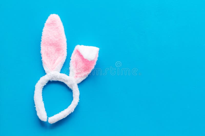 Easter Bunny Concept. Toy Rabbit`s Ears for Head on Blue Background Top ...