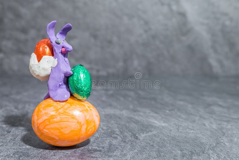 Easter Bunny Made of Purple Play Dough in Front of Grey Background ...