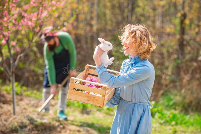 Easter Bunny. Portrait of Young Woman Posing with Rabbit. Stock Image ...