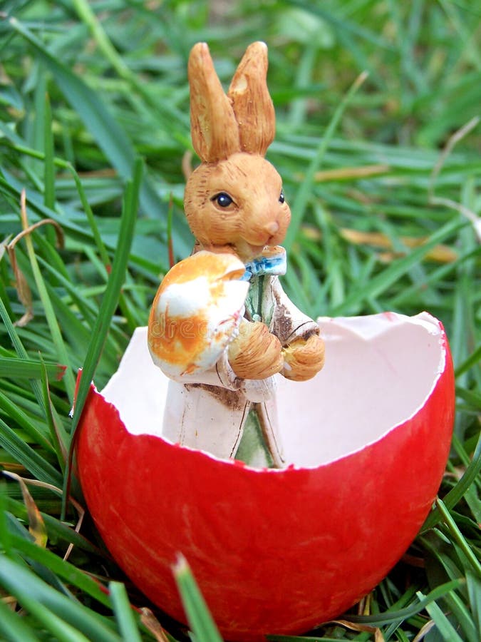 Easter bunny in a red egg stock photo. Image of mushroom - 2182682