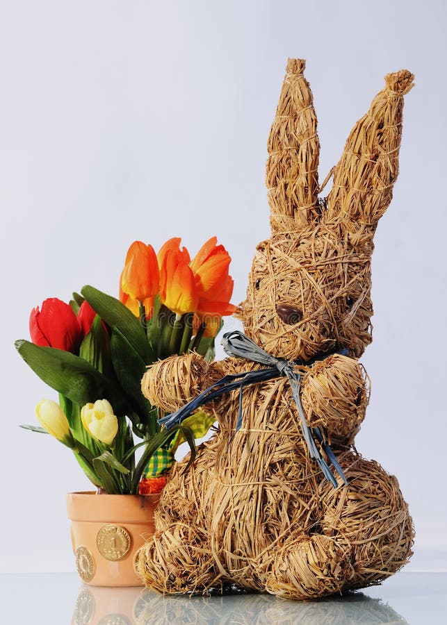 Easter Bunny from Straw with Flower Decoration Stock Photo - Image of ...