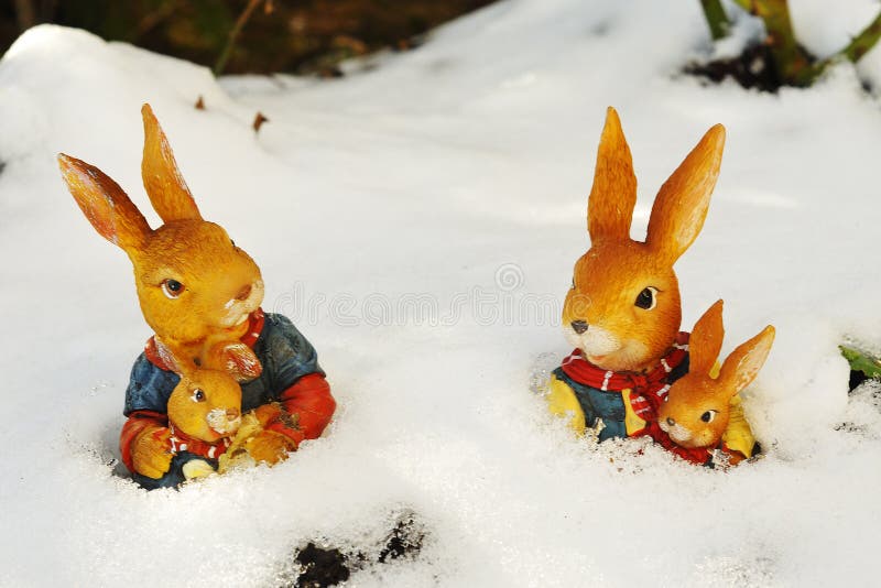 Easter bunny meets Snowman stock photo. Image of snow - 85634748