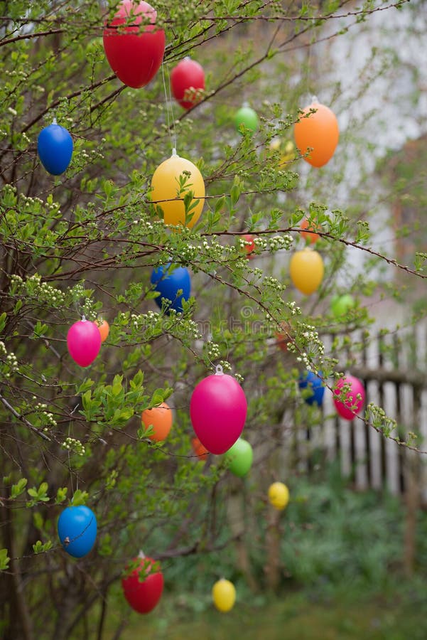 Easter Bush in the Garden with Hanging Easter Eggs Stock Photo - Image ...
