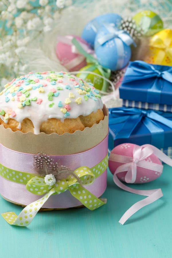 Easter Cake, Flowers and Eggs on a Turquoise Table Stock Image - Image ...