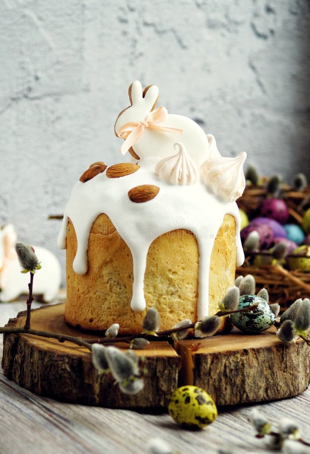 Easter Cake in the Form of a Rabbit on a Tree Cut, Table Decorated with ...