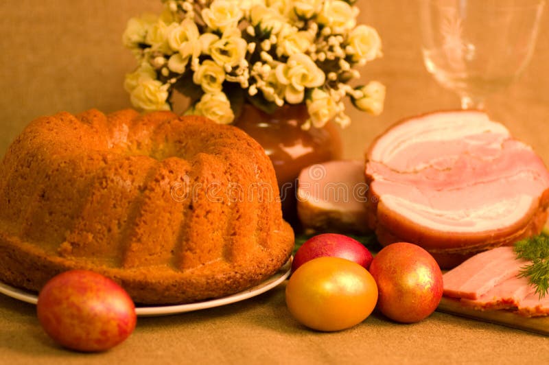 Easter Cake and Pork Loin Dish with Easter Eggs Stock Image - Image of ...