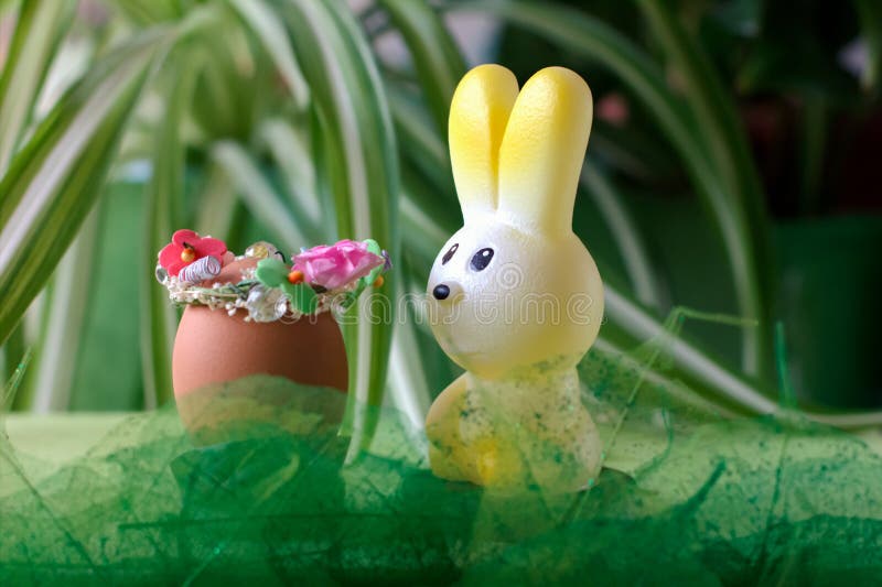 Easter Celebration Concept. Toy Bunny And Decorated Easter Egg On Grass ...