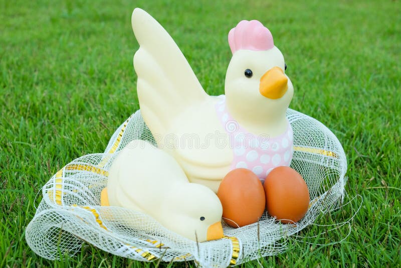 Chicken With Many Chicks Huddled Around Stock Photo - Image of adorable ...