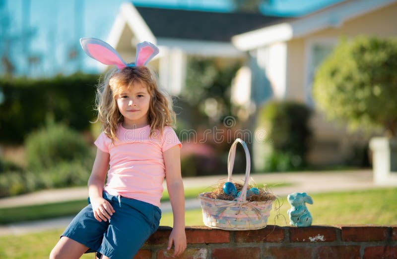Easter Children. Child in Bunny Ears Hold Easter Egg. Boy Hunting ...