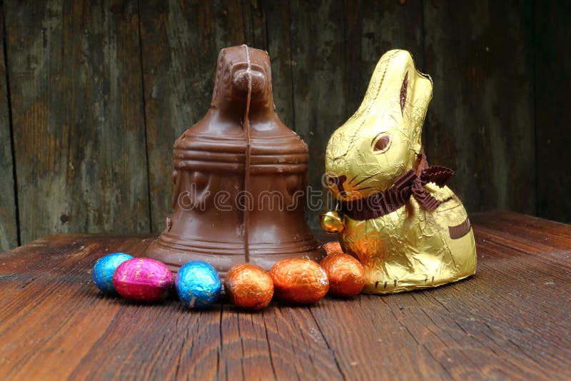 Easter Chocolate Bell and Rabbit with Eggs Stock Photo - Image of ...